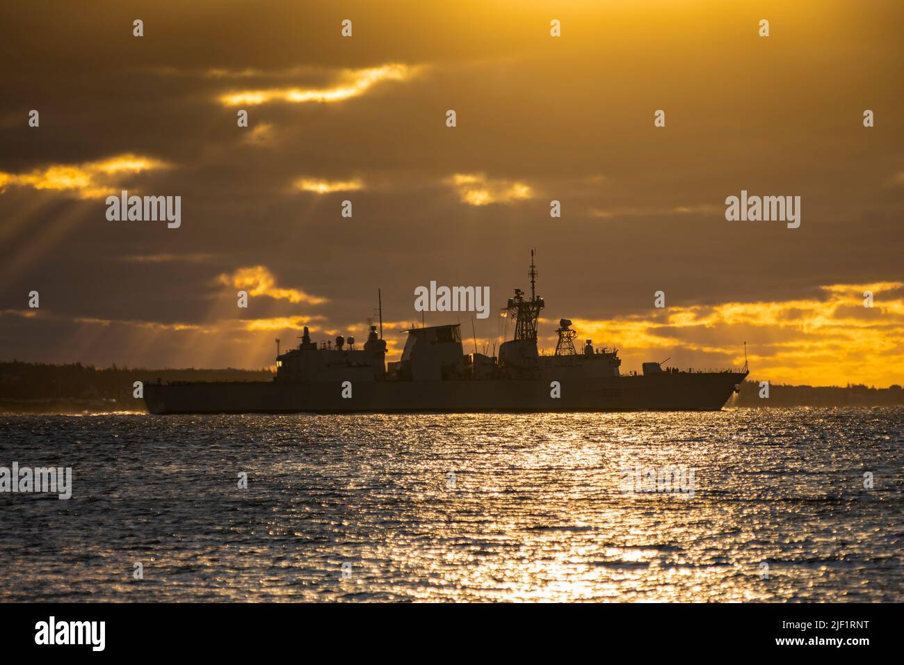 Silhouetted against the sunrise, Royal Canadian Navy Halifax-class ...