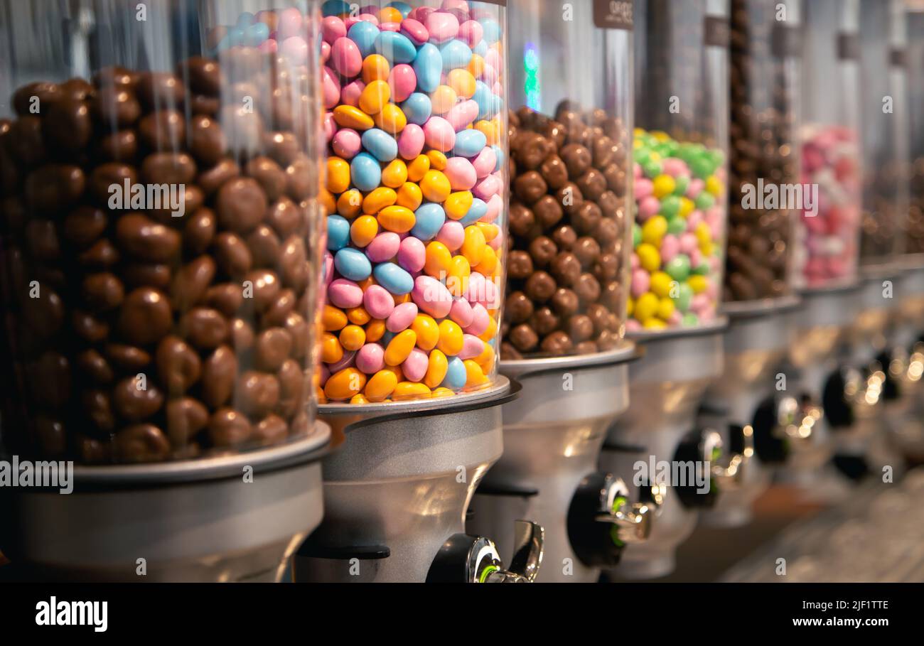 Bright candies in containers by weight in a candy store Stock Photo - Alamy