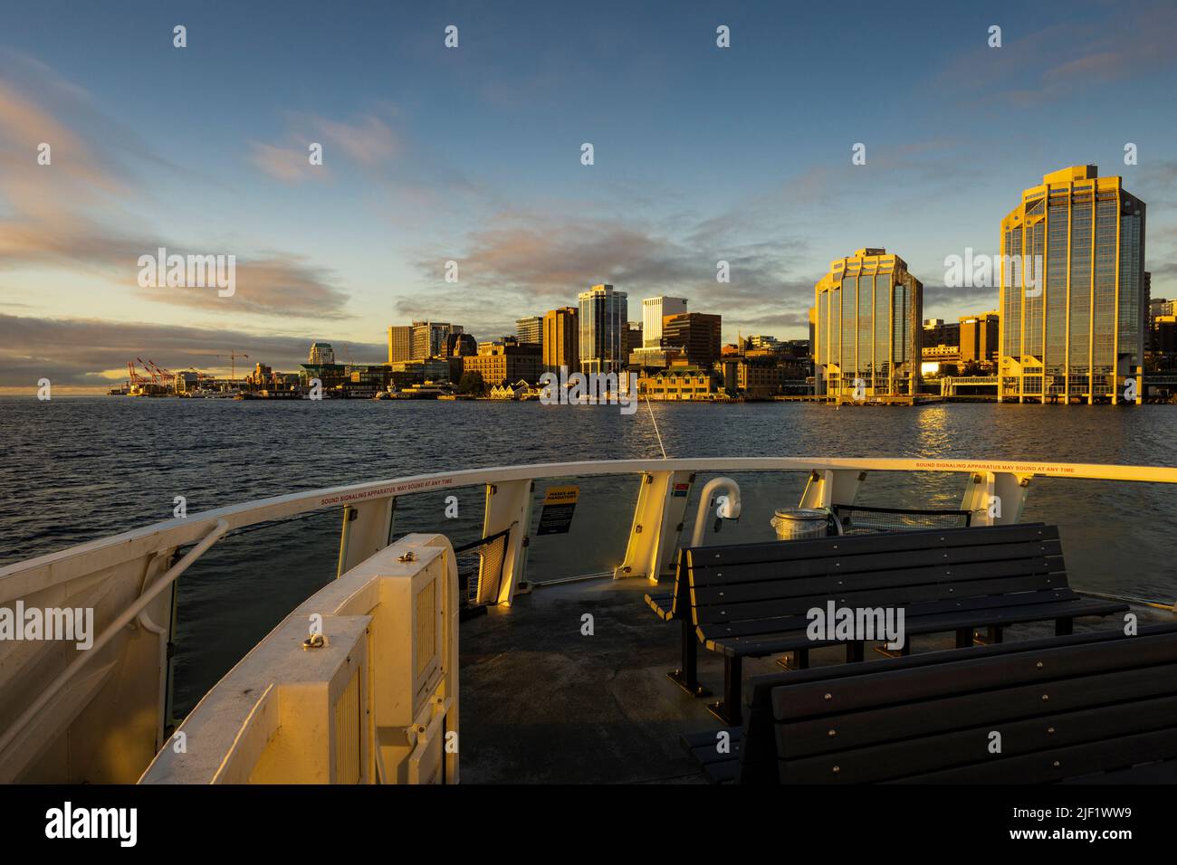 Dawn skyline as seen from the harbour ferry in Halifax, Nova Scotia ...