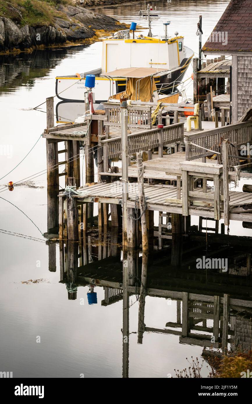 Wooden fishing wharves along the shore at Blue Rocks, Nova Scotia ...
