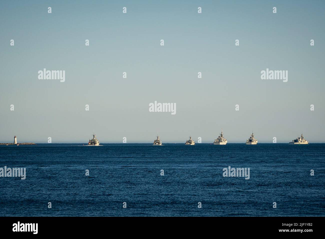 Warships departing from Halifax, Nova Scotia, in a line ahead formation ...