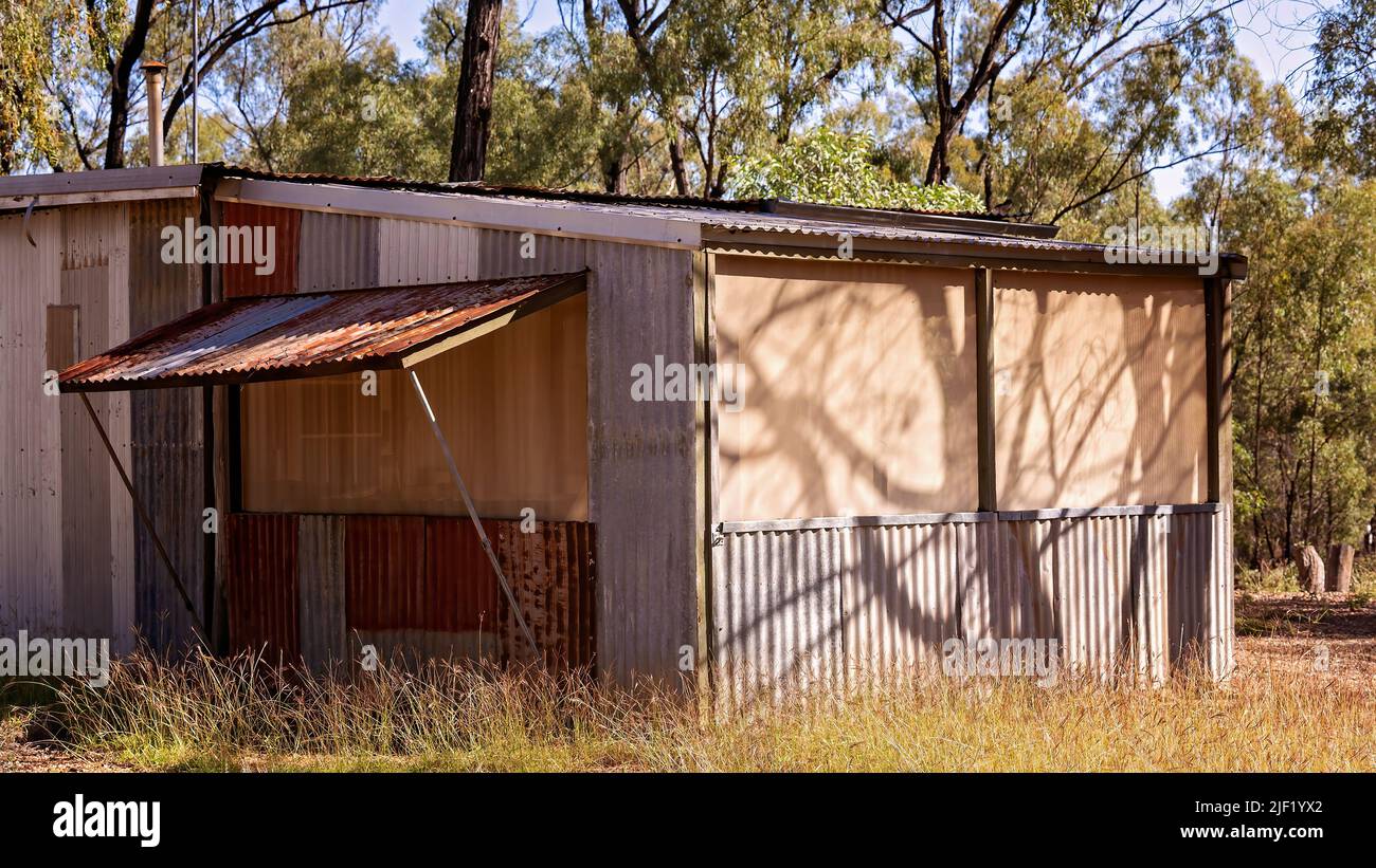 An old tin hut sitting abandoned on the Reward fossicking area at the ...