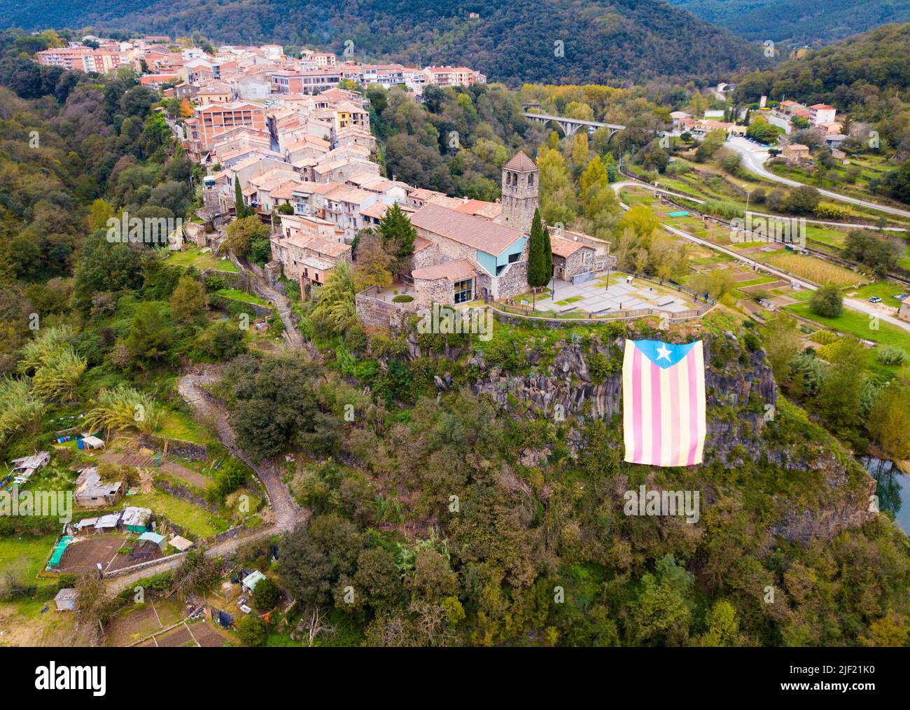 Castellfollit de la Roca on rocky cliff, Spain Stock Photo - Alamy