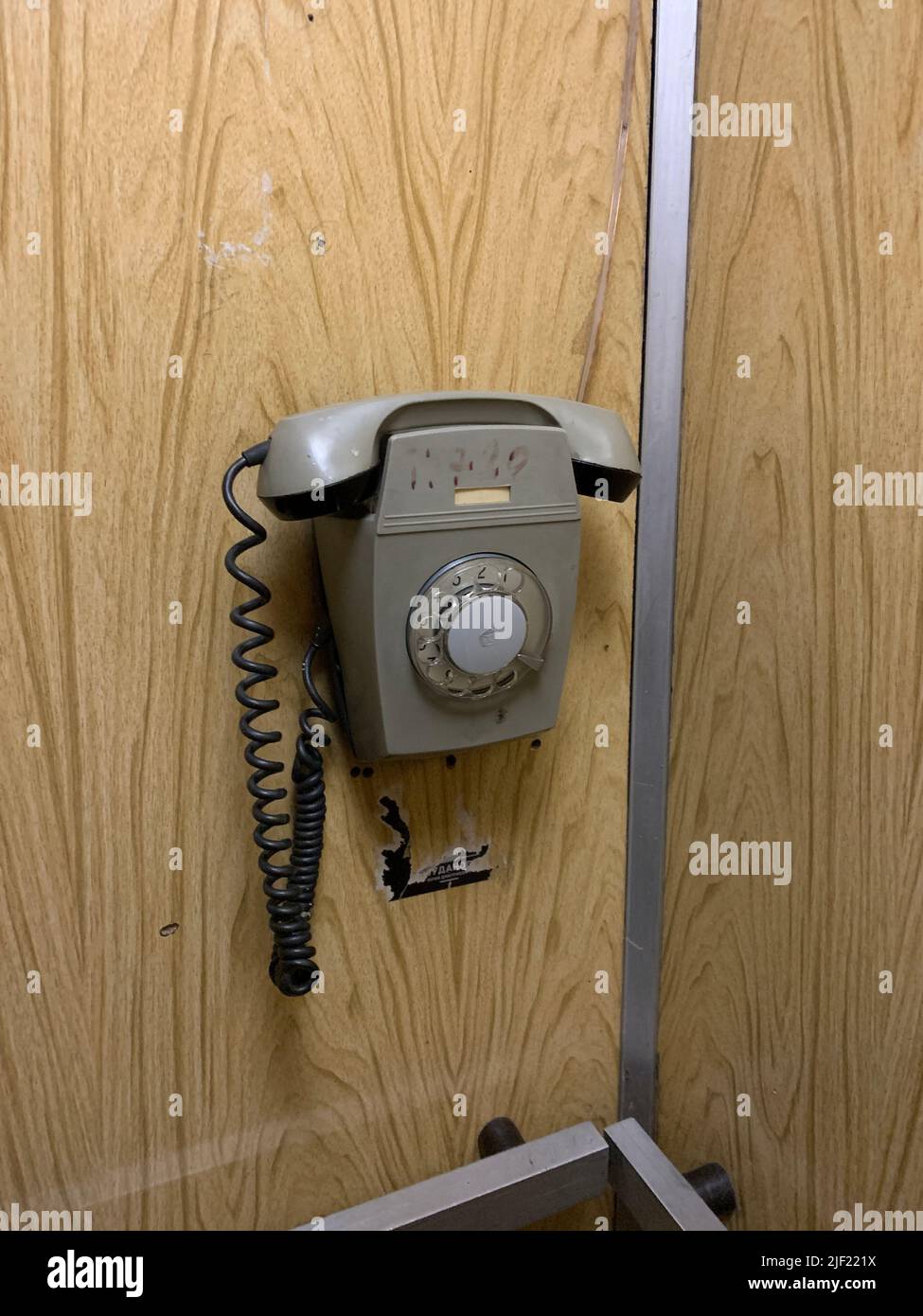 Photograph of a vintage telephone in an elevator Stock Photo - Alamy