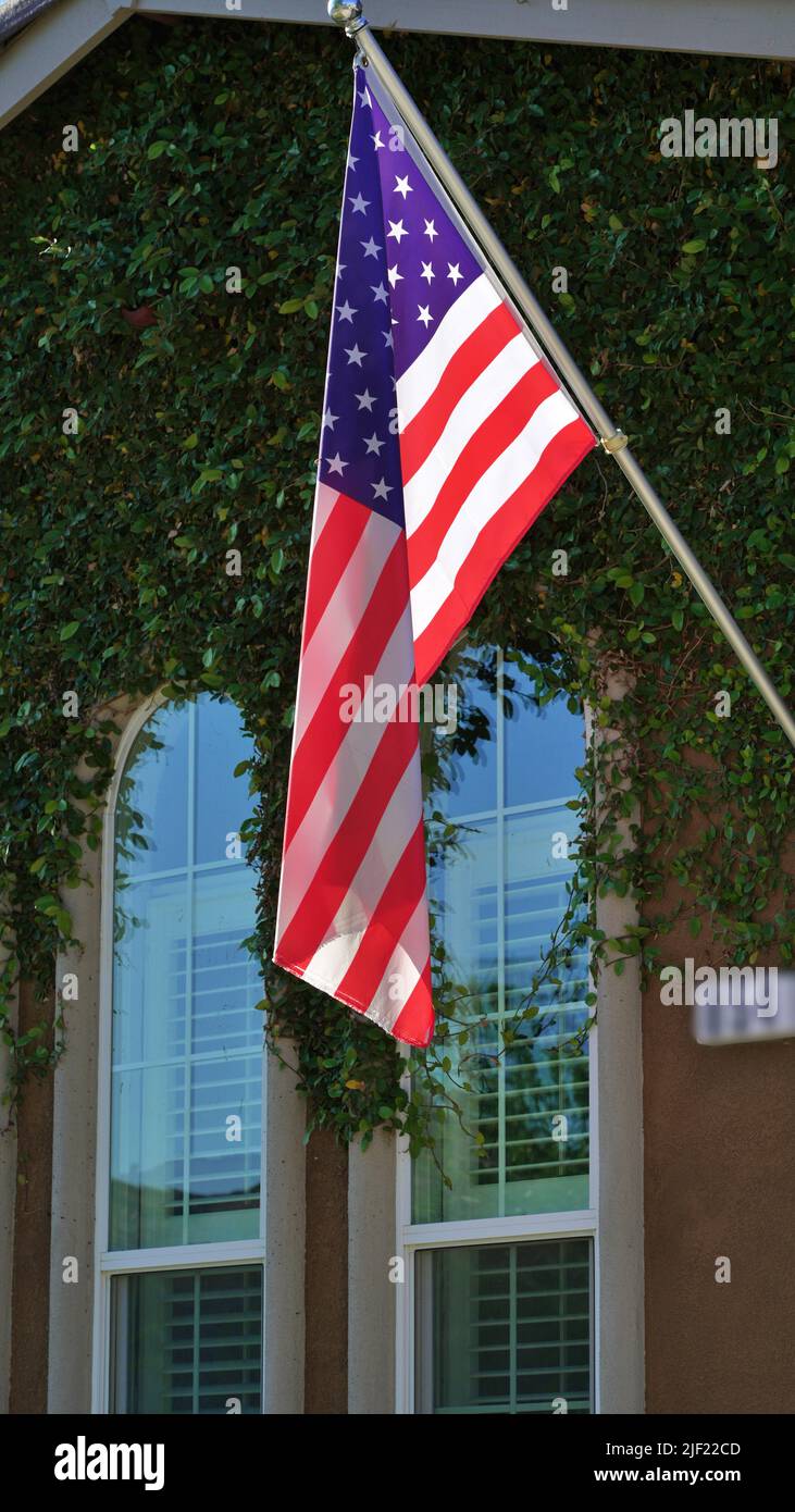 American flag hanging on pole hi-res stock photography and images - Alamy