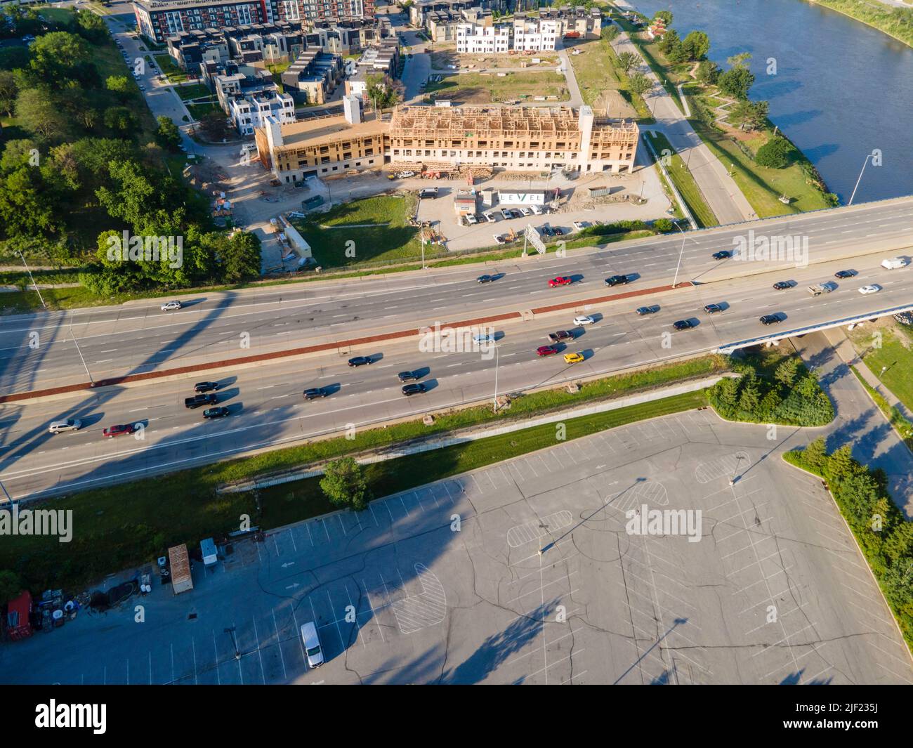 Aerial photograph of traffic driving through downtown and over the Des ...