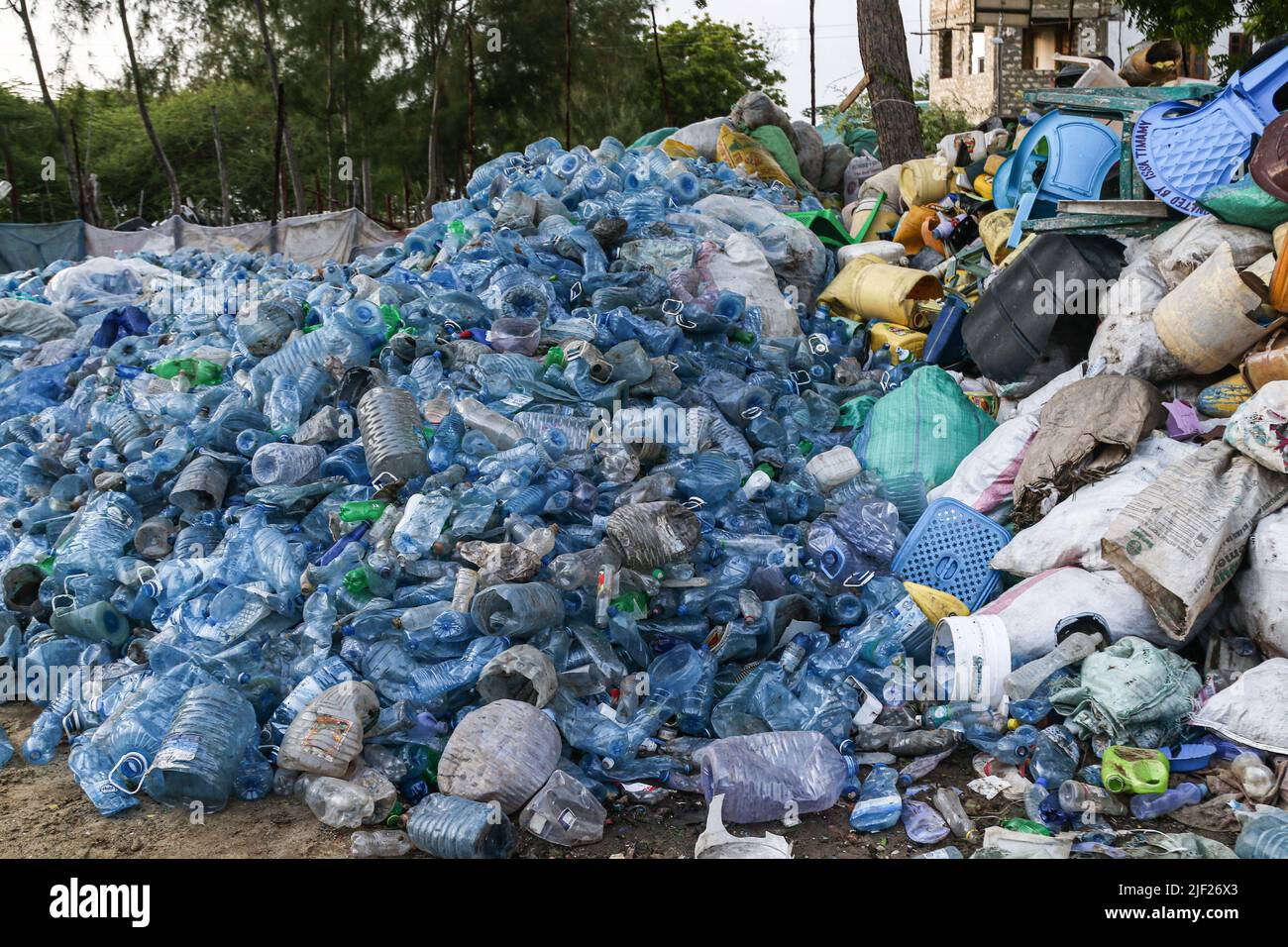 A view of plastic bottle waste made from polyethylene terephthalate is ...