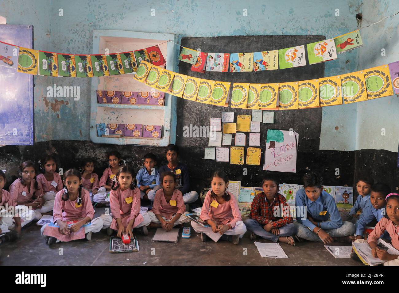 A view children attending a class at a government school in rural area ...