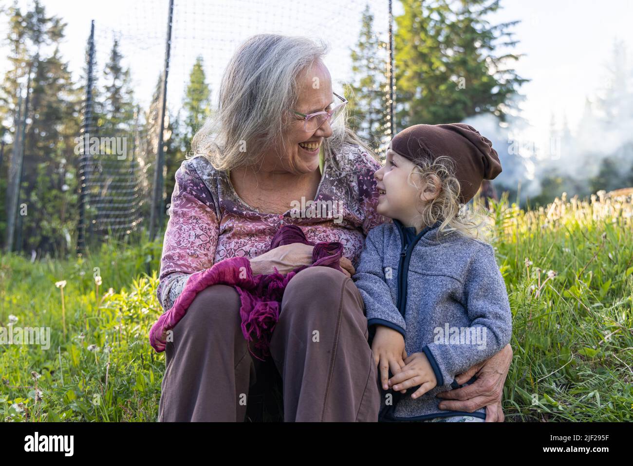 Sweet family moment as aging grandmother and young grandson are seen ...