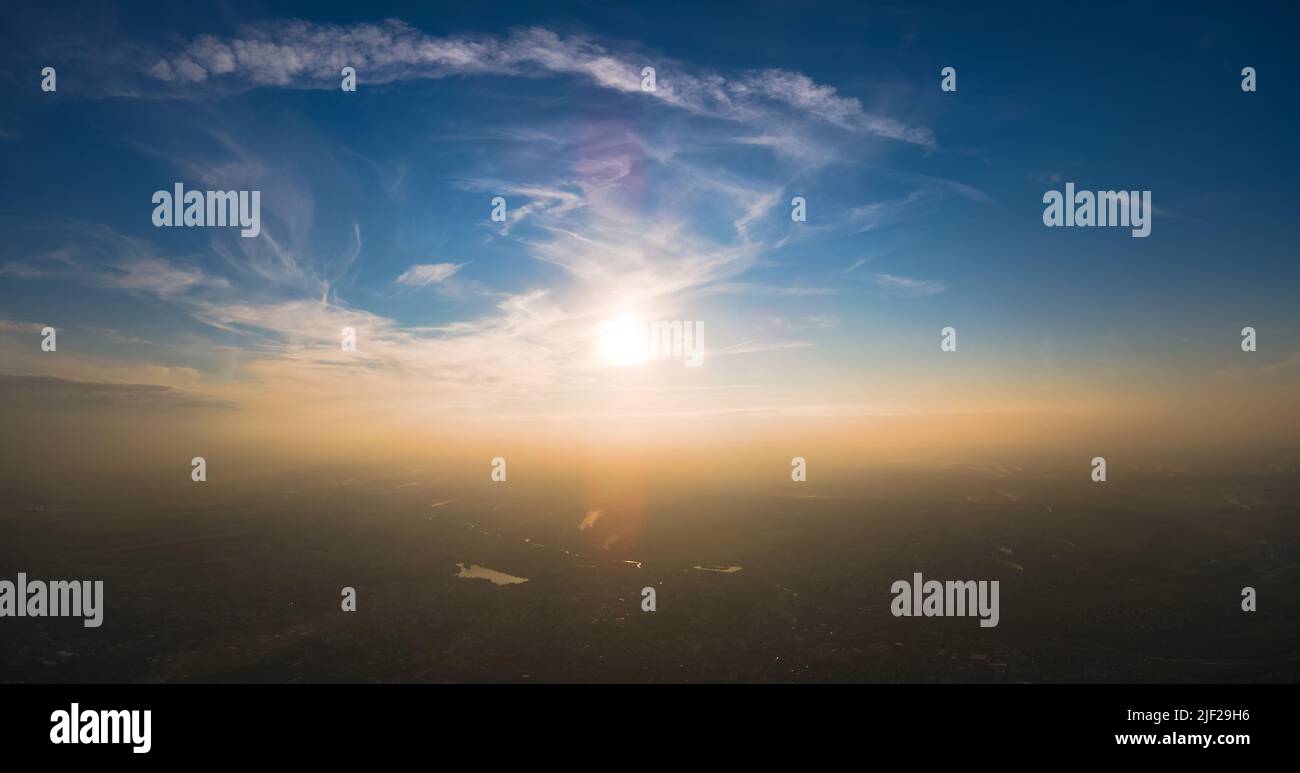 Aerial view from airplane window at high altitude of earth covered with ...