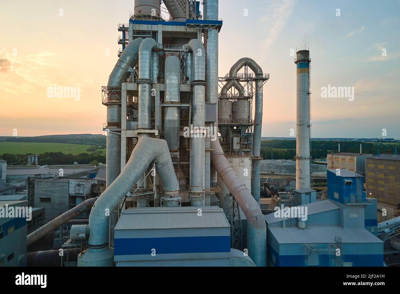 Aerial view of cement factory with high concrete plant structure and ...