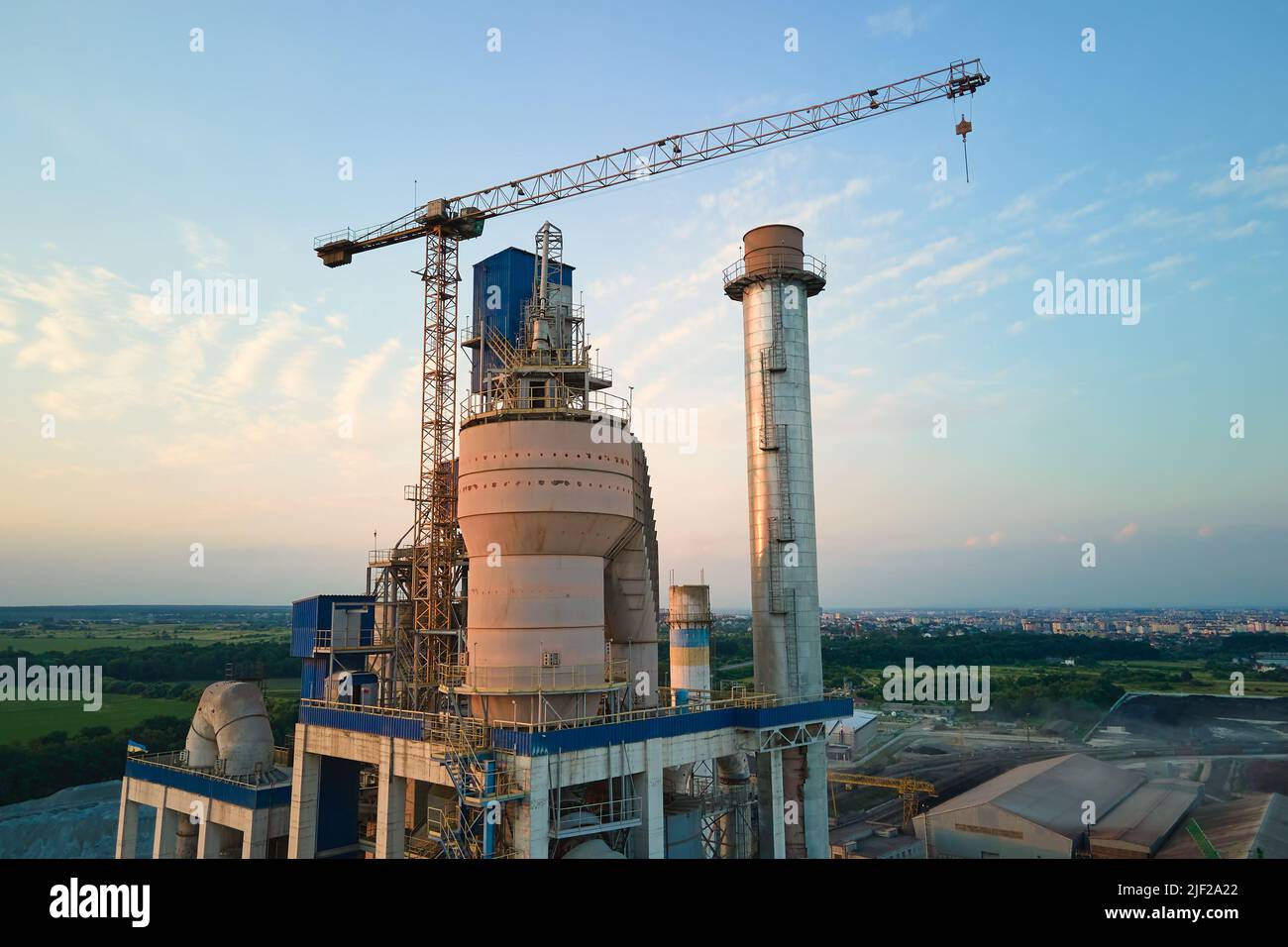 Aerial view of cement factory with high concrete plant structure and ...