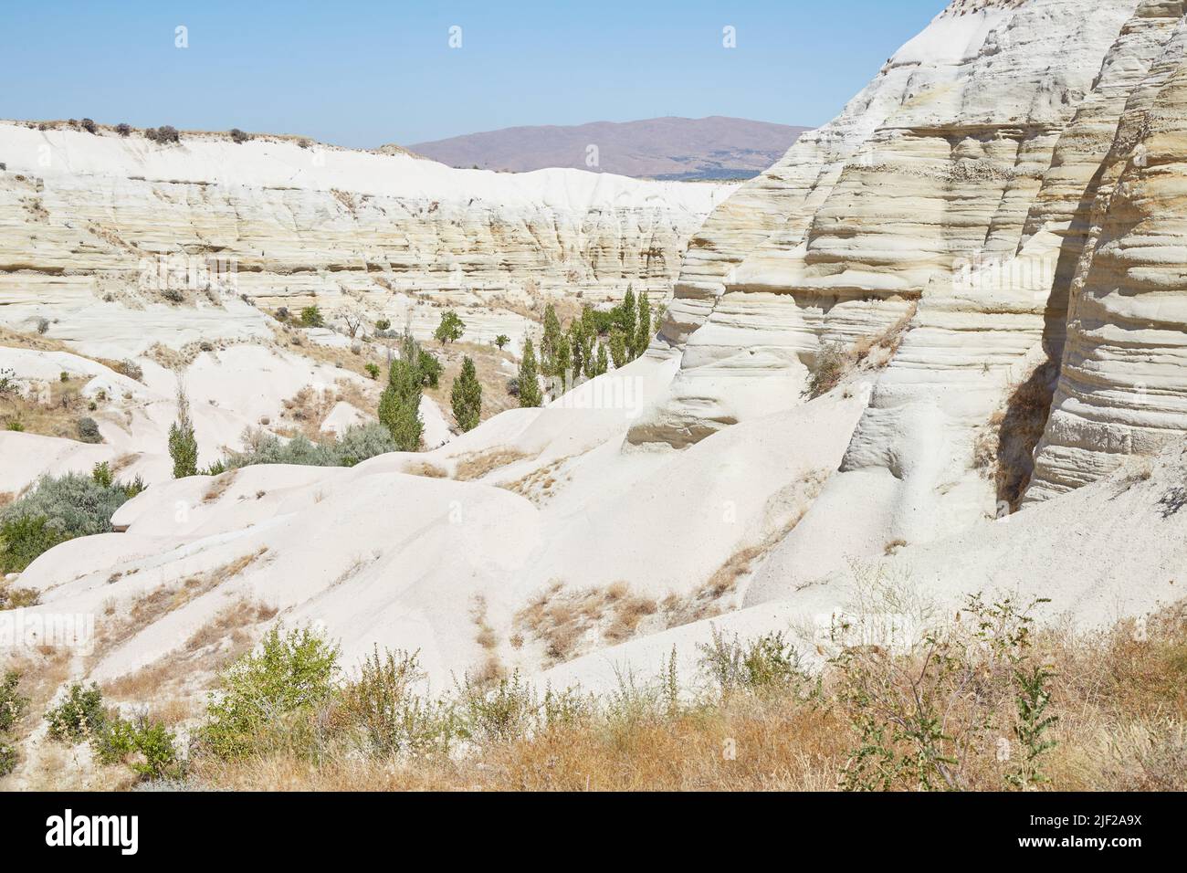Hiking Through Cappadocia's White Valley Stock Photo - Alamy