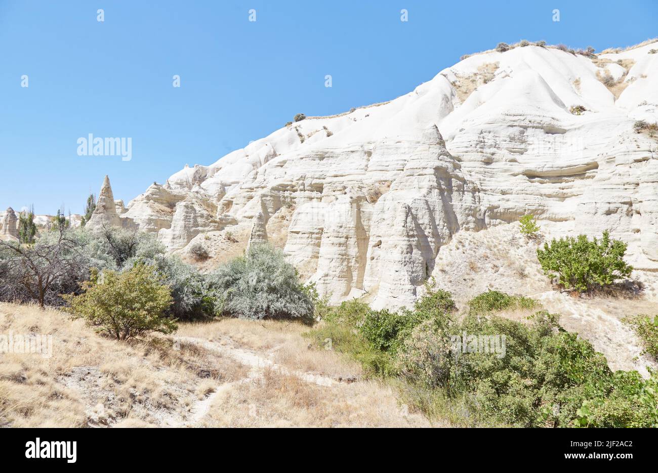 Hiking Through Cappadocia's White Valley Stock Photo - Alamy