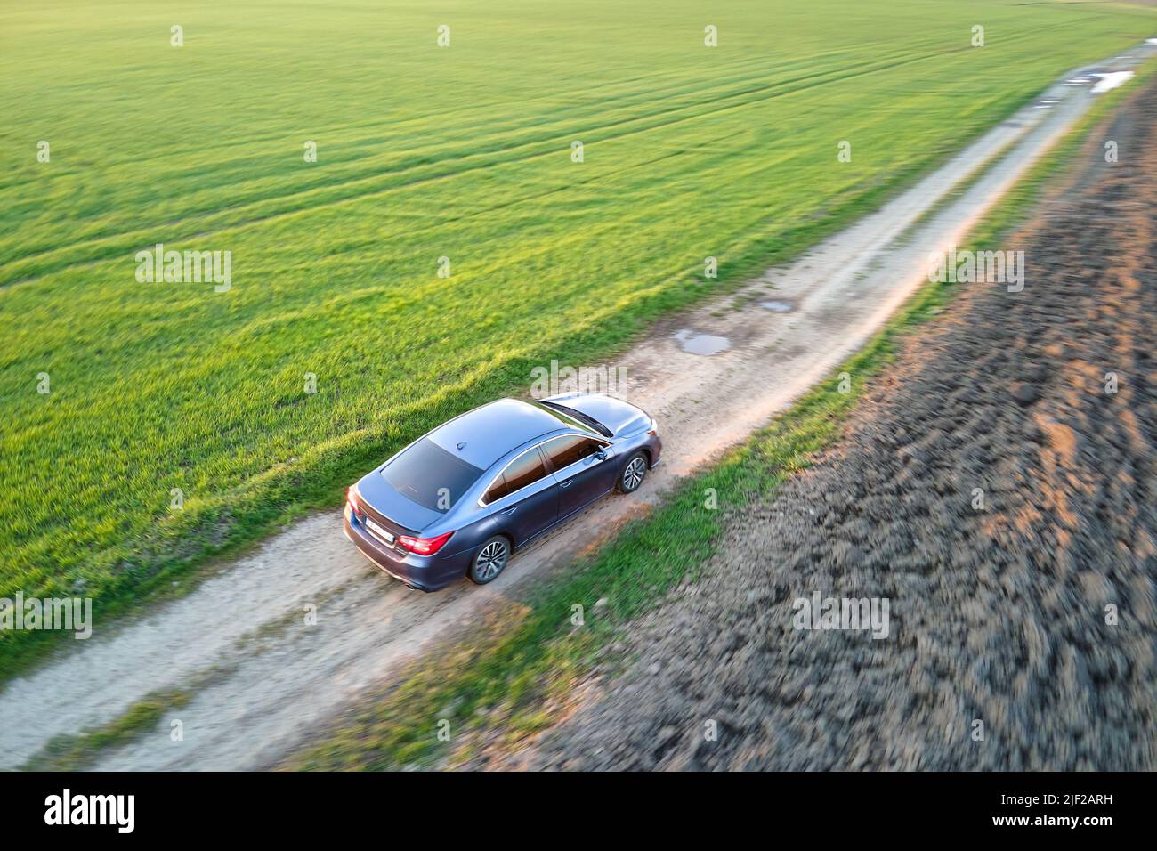 Aerial view sedan car driving hi-res stock photography and images - Alamy