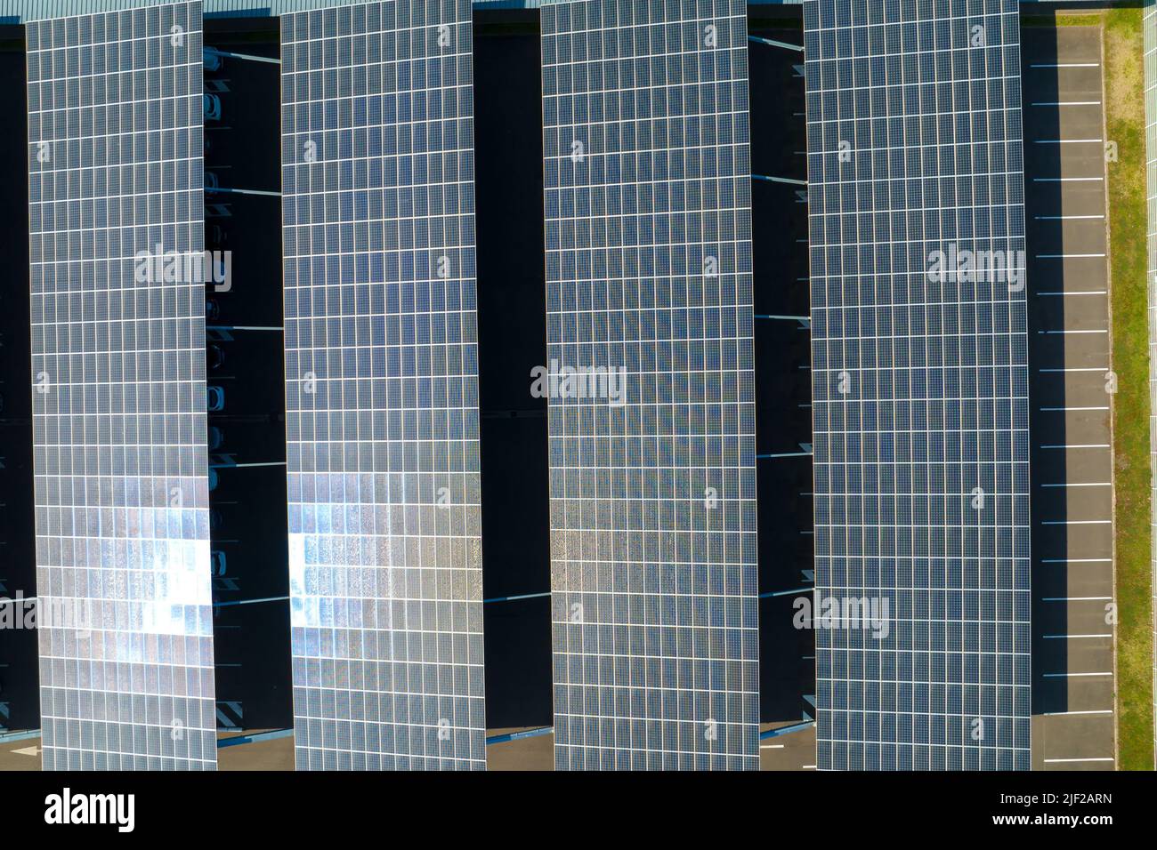 Aerial view of solar panels installed as shade roof over parking lot ...