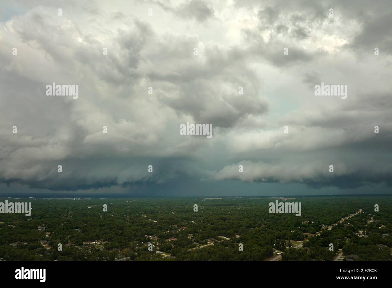 Landscape of dark ominous clouds forming on stormy sky before heavy ...