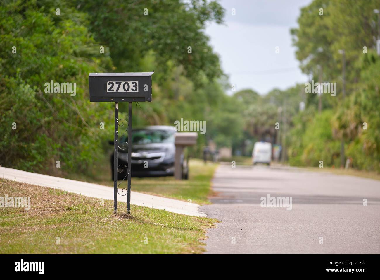Typical american outdoors mail box on suburban street side Stock Photo ...