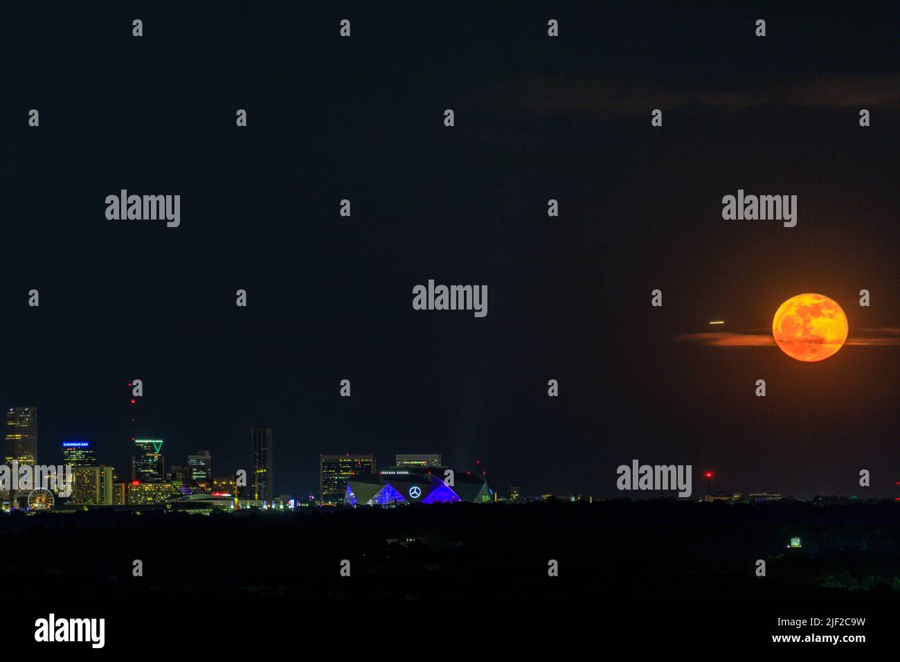 Super moon rising over downtown Atlanta Stock Photo - Alamy