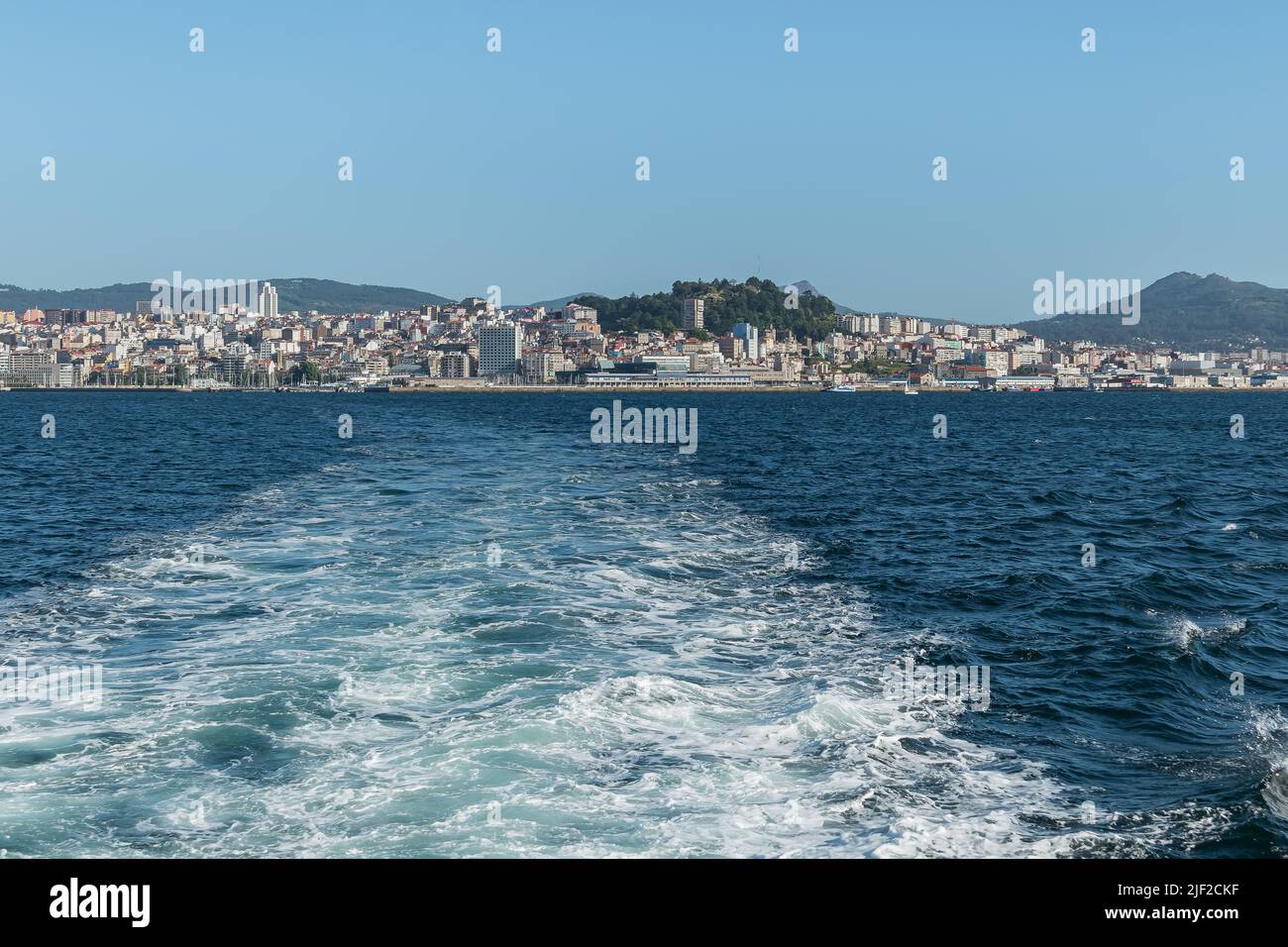 passenger port and downtown of Vigo in Galicia, Spain seen from a boat ...