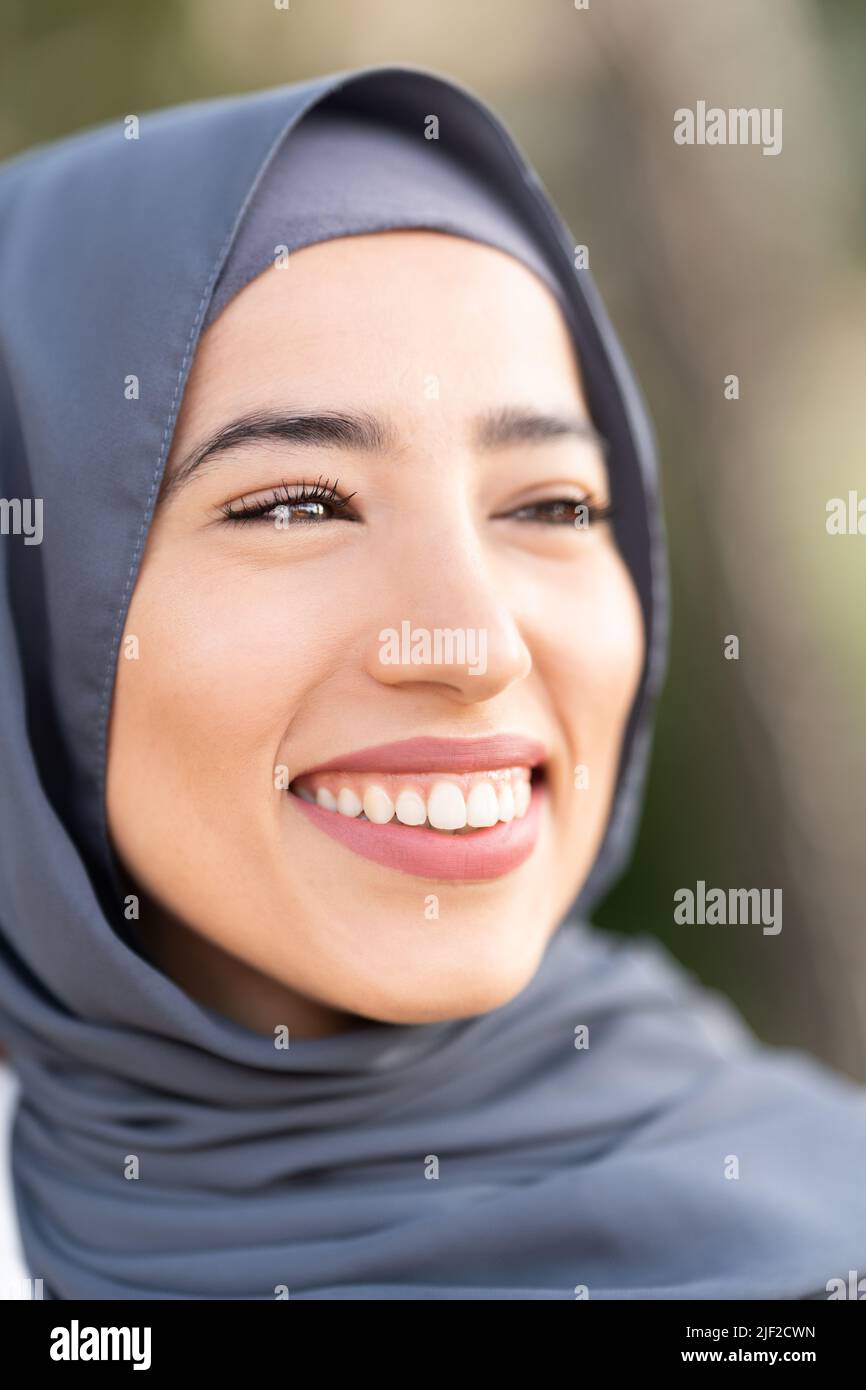 Vertical close-up portrait of an attractive muslim woman Stock Photo ...