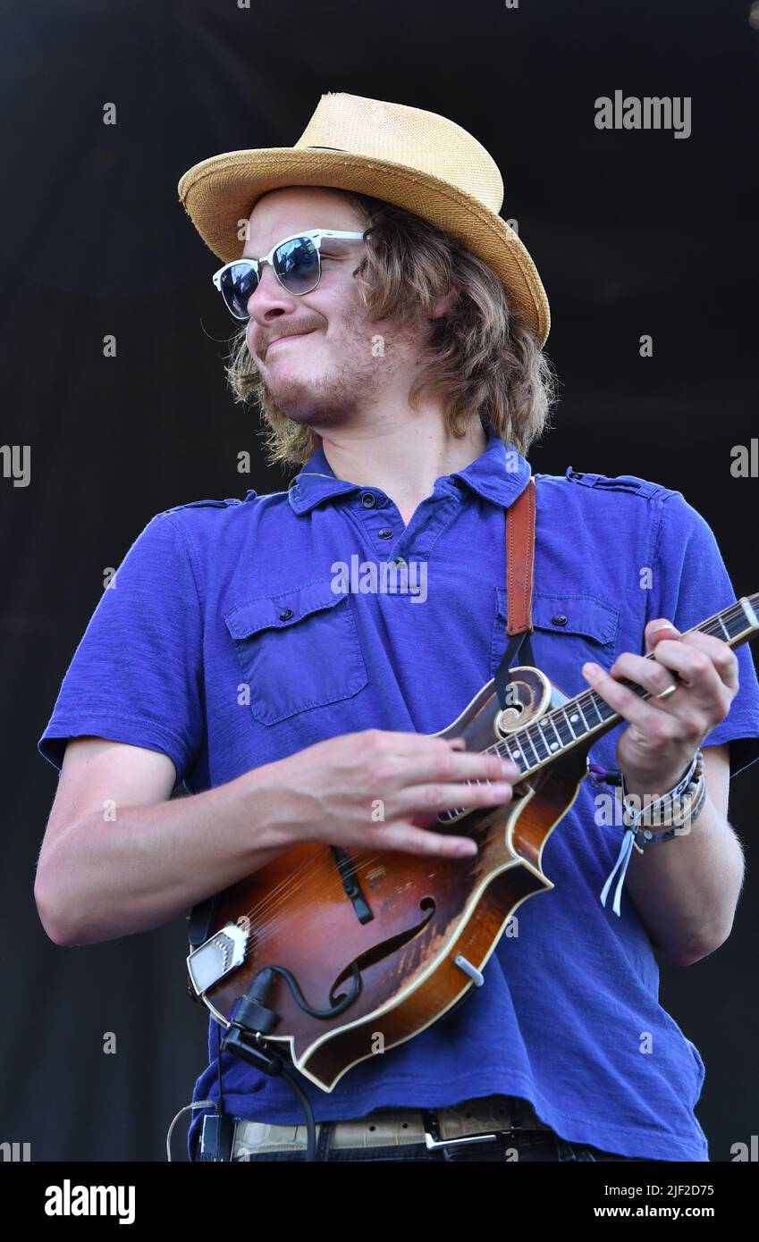 Mandolinist Dominick Leslie is shown performing on stage during a “live ...