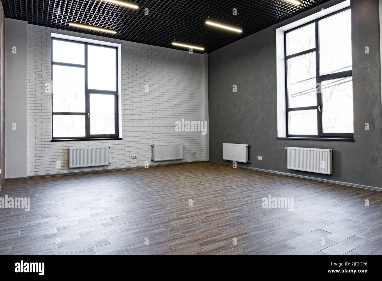 Empty open space office room with window Stock Photo - Alamy