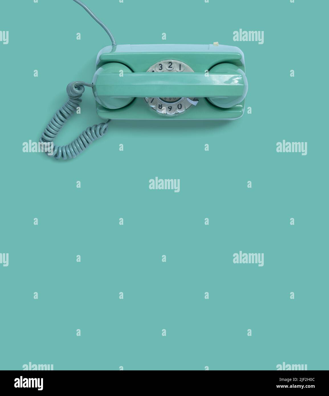 A green vintage dial telephone Stock Photo - Alamy