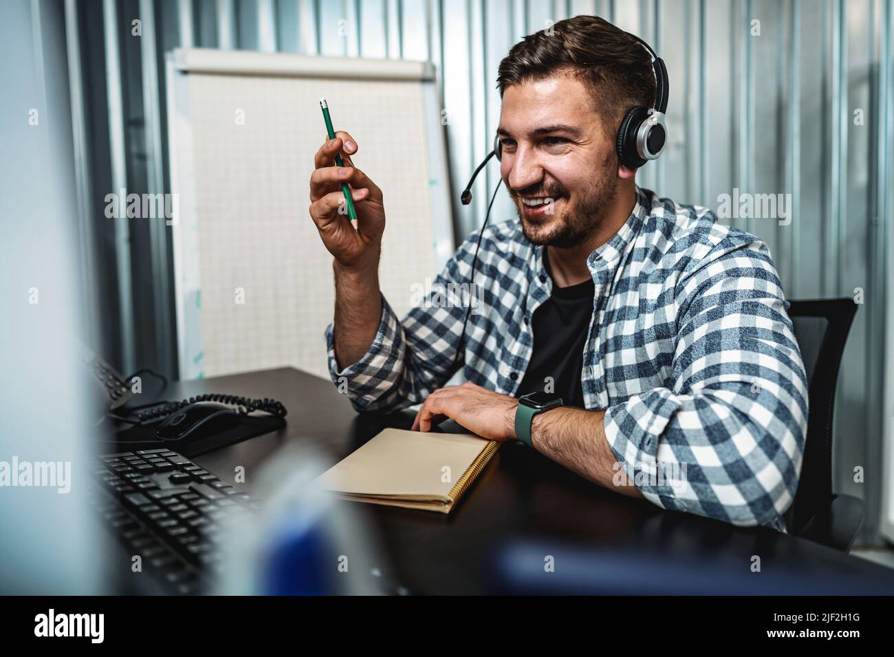 Customer service support operator man with headphones and microphone ...