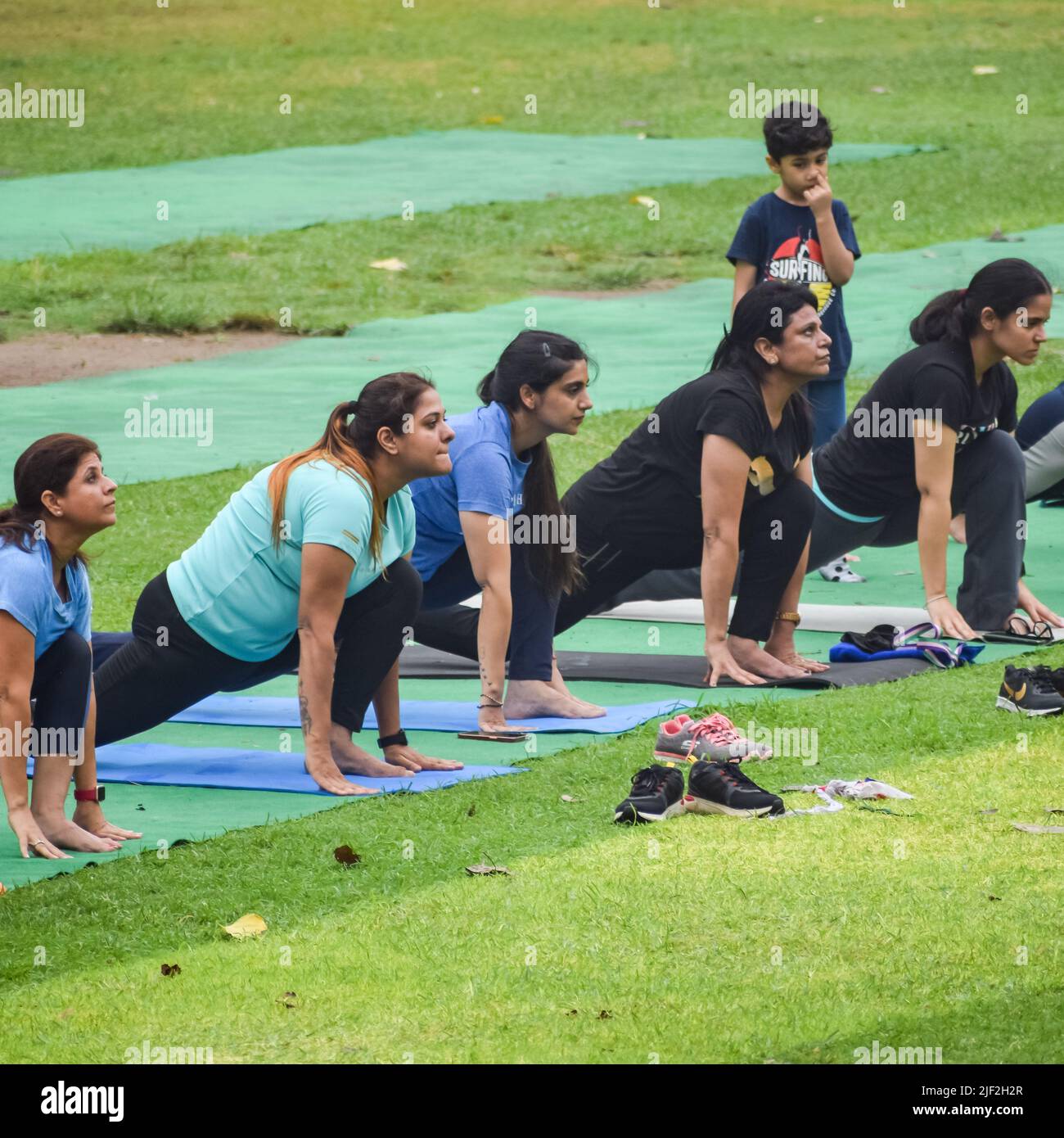 New Delhi, India, June 18 2022 - Group Yoga exercise class Surya ...