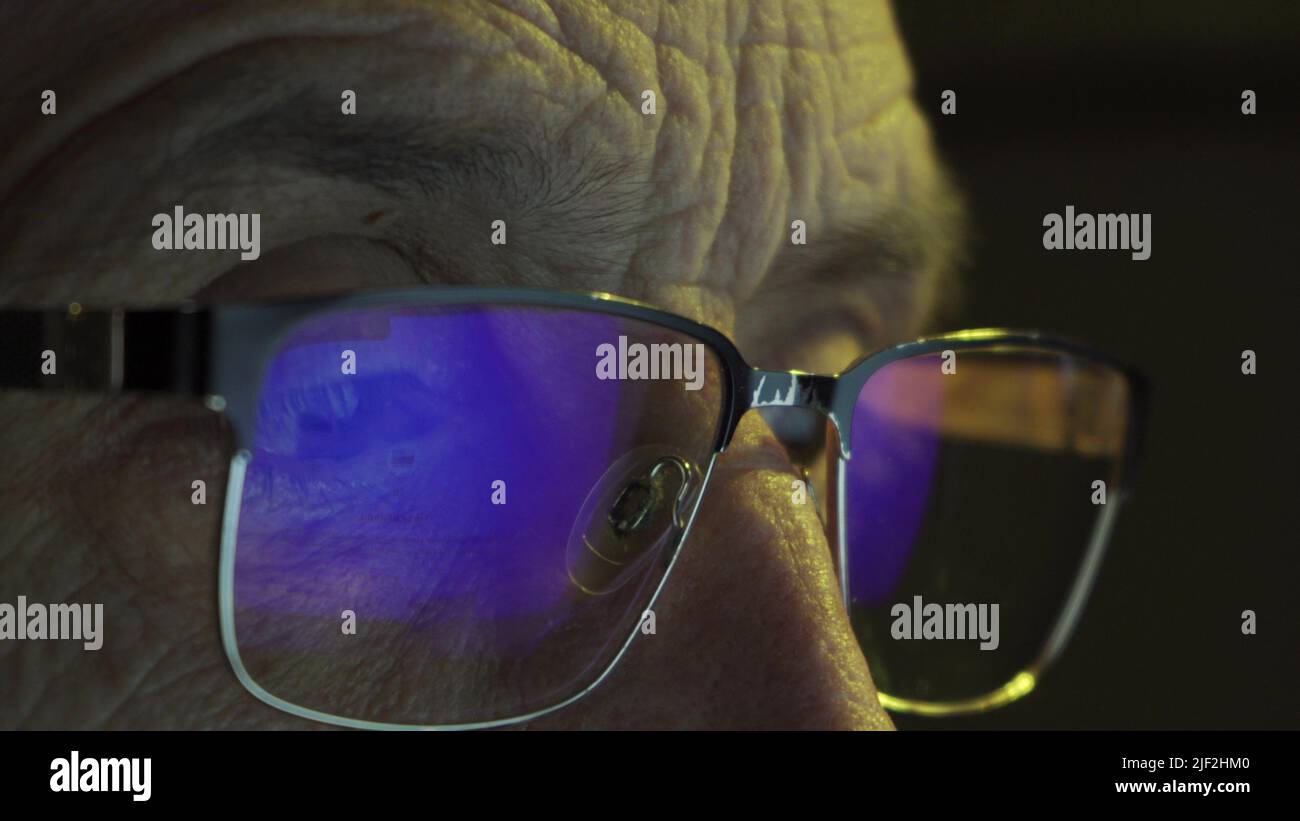 focused eyes of a businessman wearing computer glasses Stock Photo - Alamy