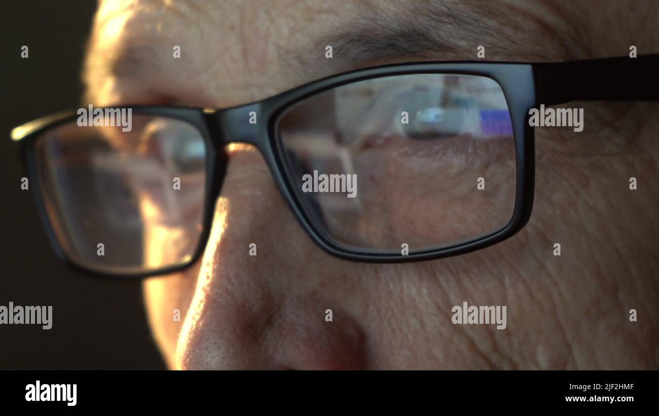 focused eyes of a businessman wearing computer glasses Stock Photo - Alamy