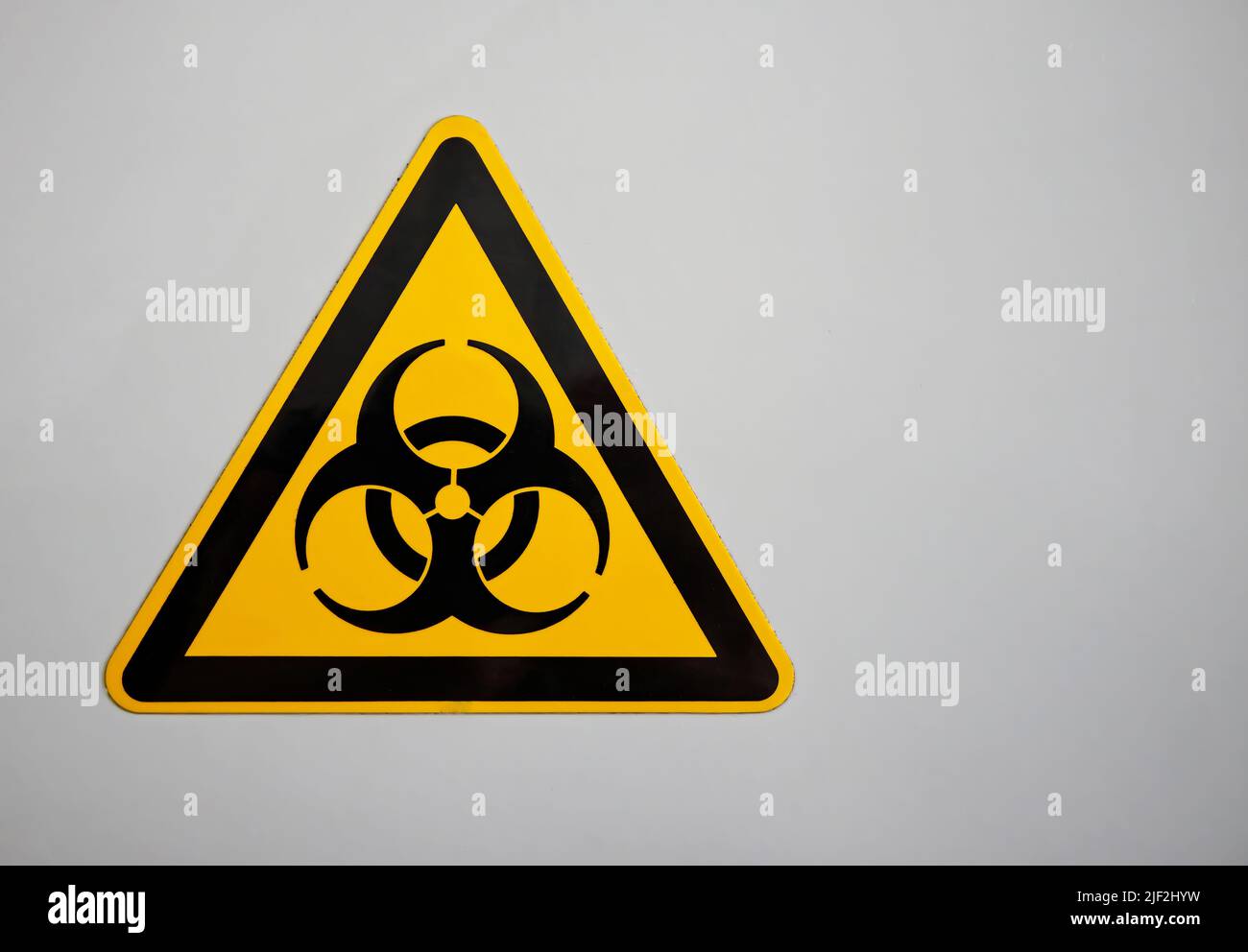 Biohazard sign on the laboratory wall isolated on clear background ...