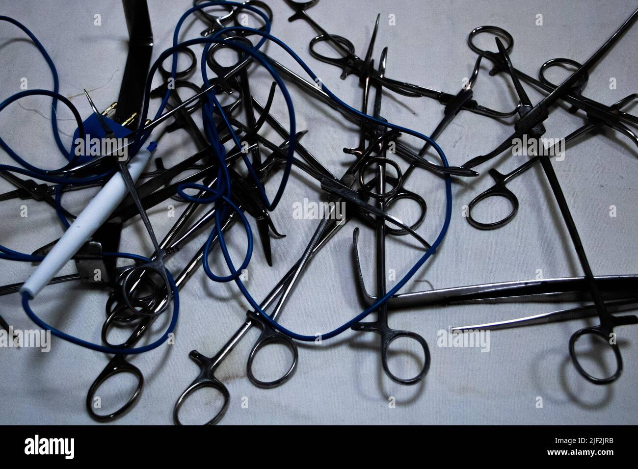 Used operation material placed on a table to get sterilized. The ...