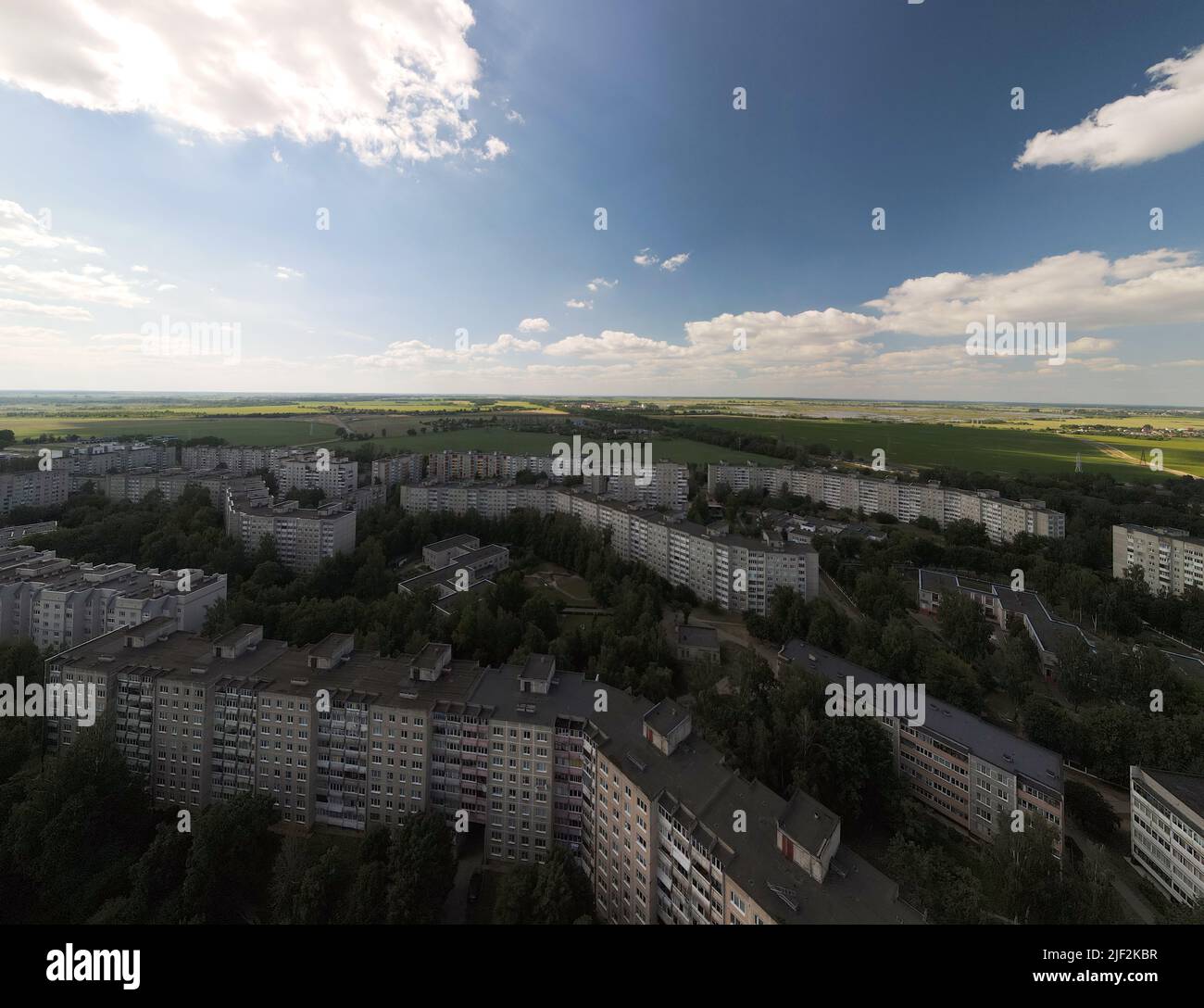 Tranquil suburbs in a big city. Multi-storey buildings and a large ...