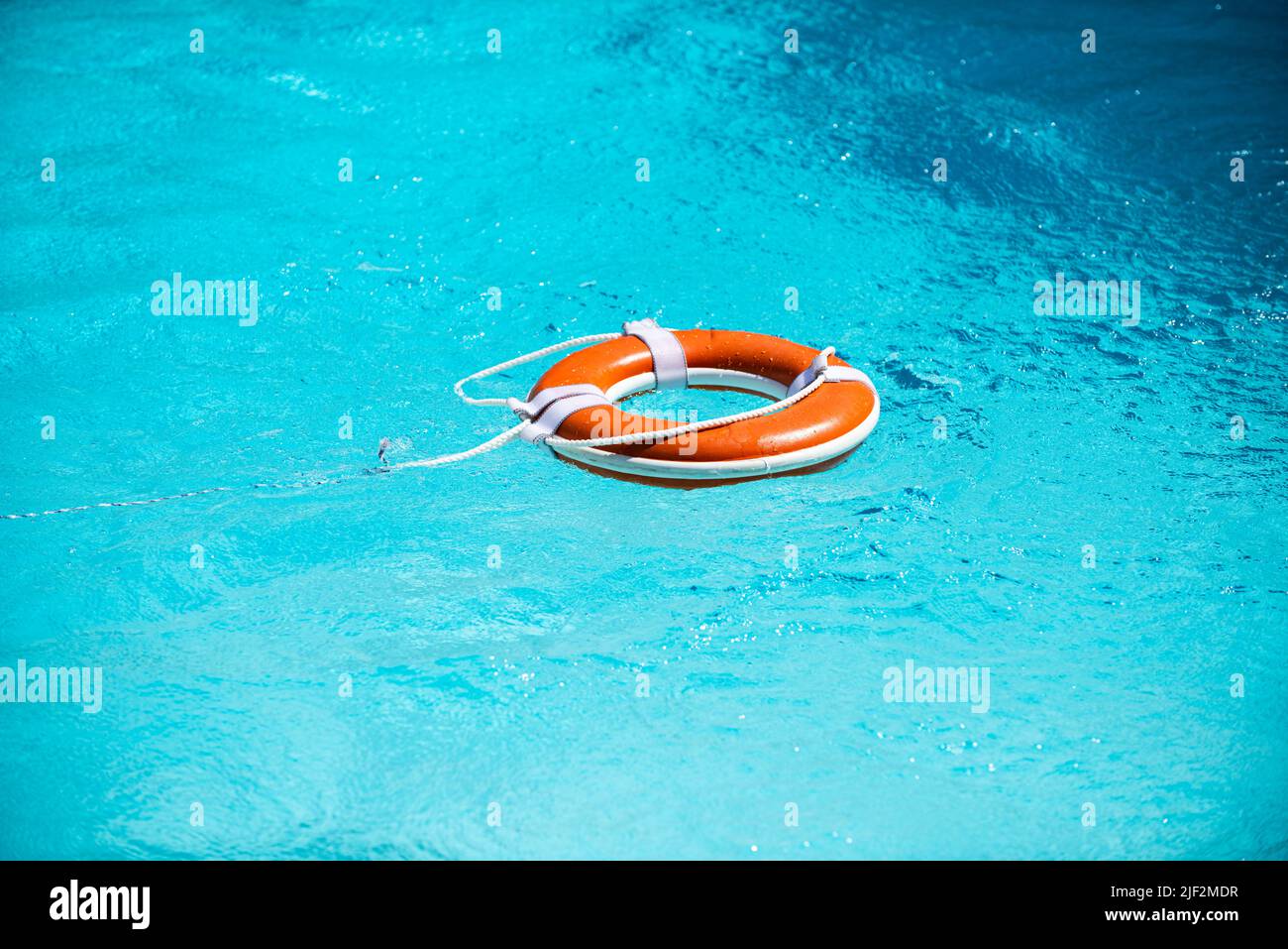 Safety equipment, Life buoy or rescue buoy floating on sea to rescue ...