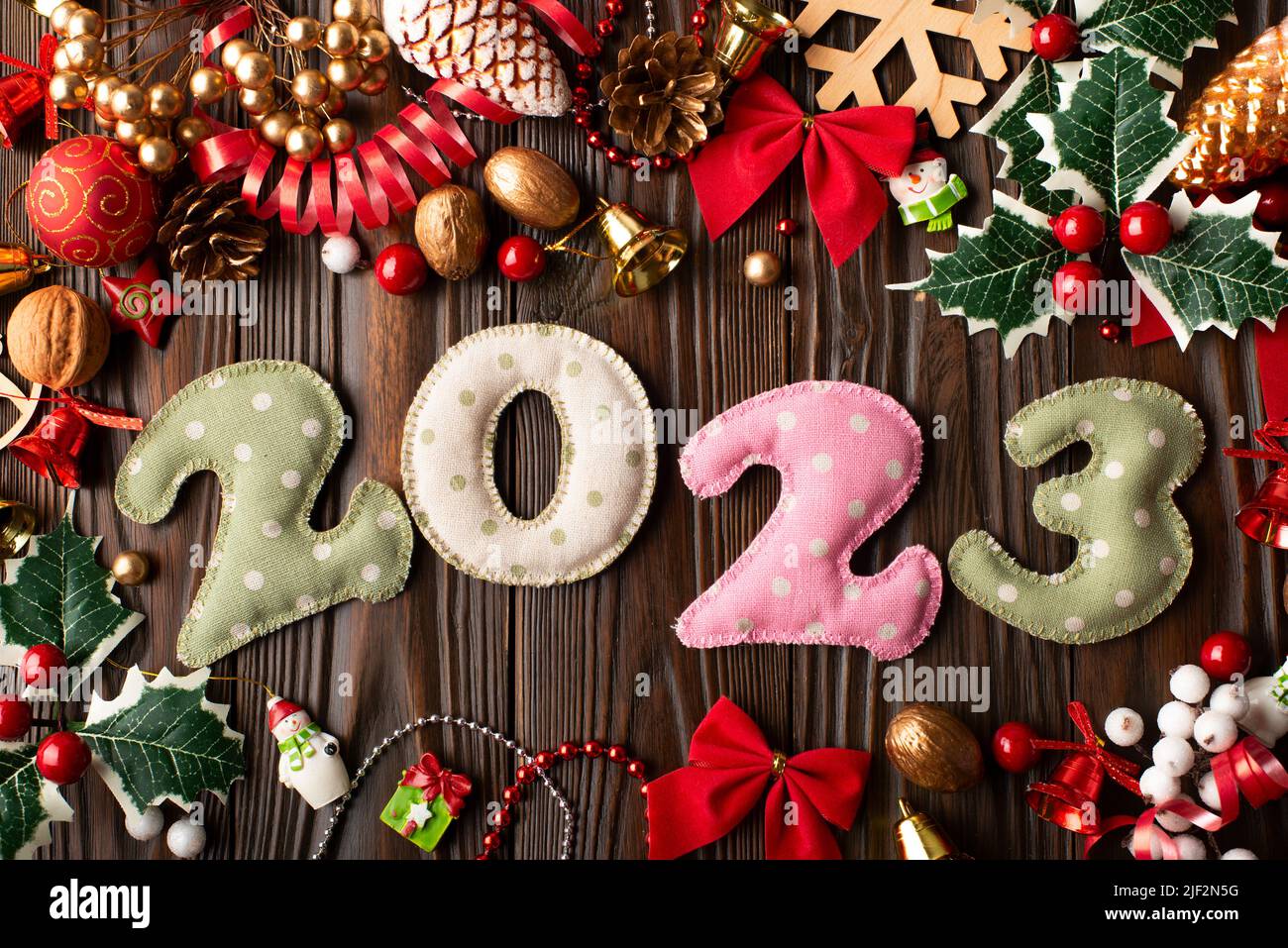 Colorful stitched digits 2022 of polkadot fabric with Christmas ...