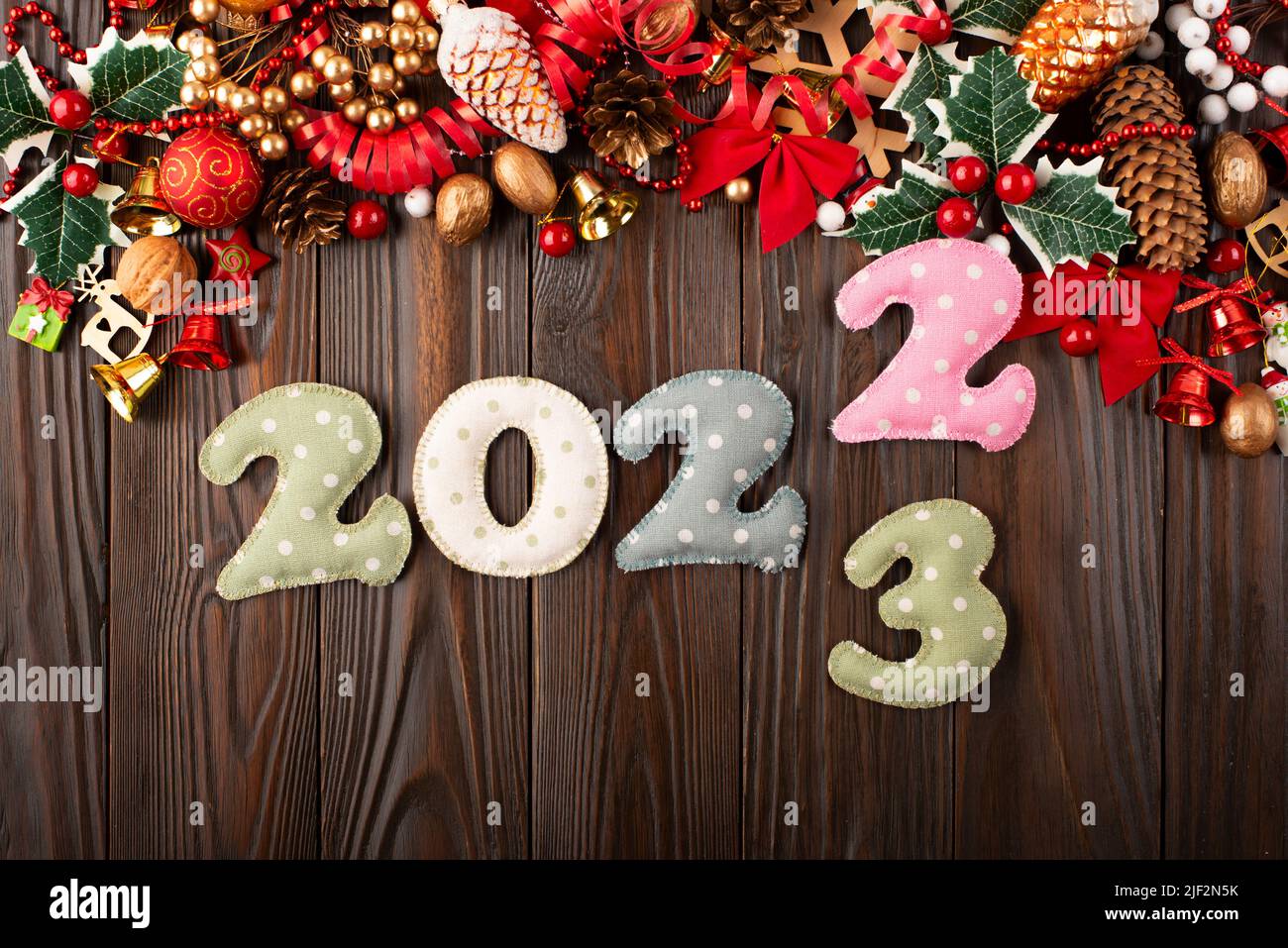 Colorful stitched digits 2022 of polkadot fabric with Christmas ...