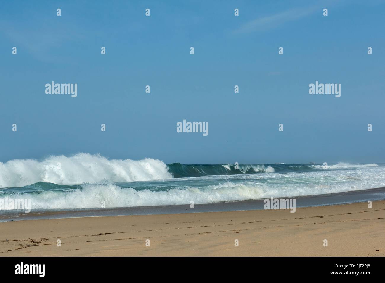The big breaking waves during a strom at the beautiful summer sea shore ...