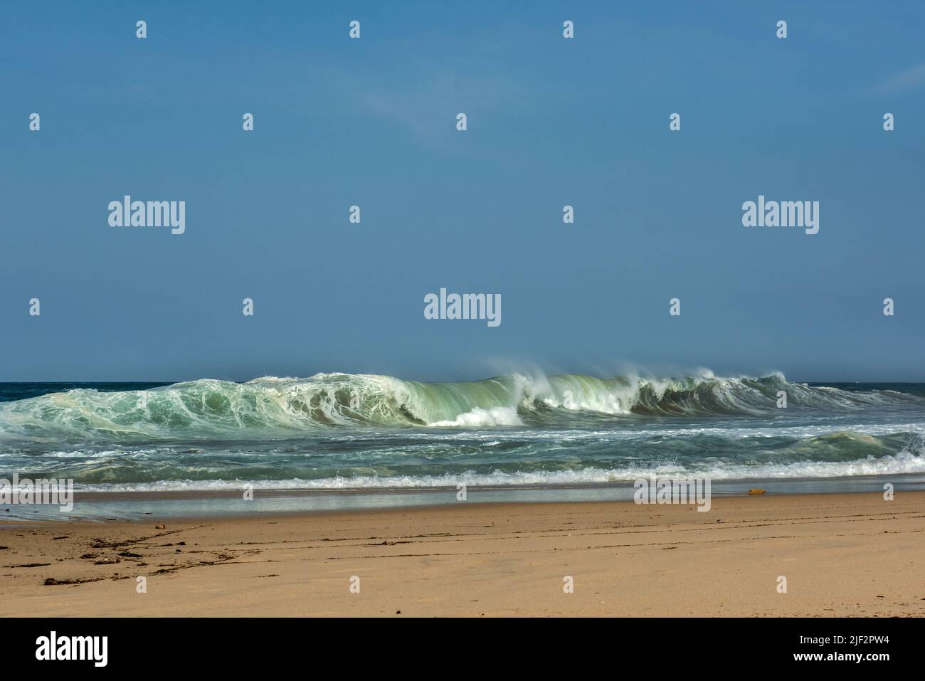 The big breaking waves during a strom at the beautiful summer sea shore ...