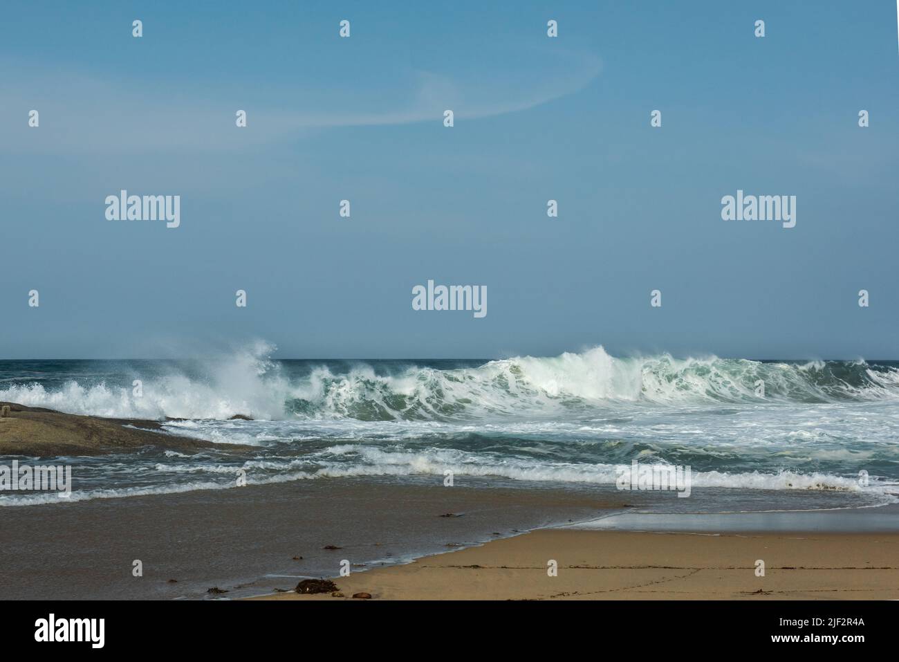 The big breaking waves during a strom at the beautiful summer sea shore ...