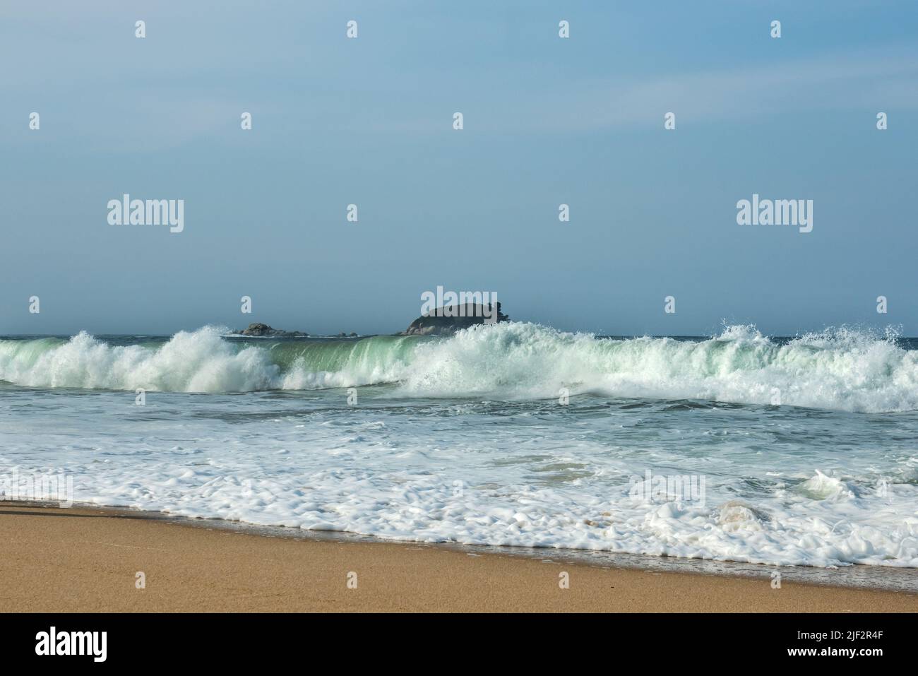 The big breaking waves during a strom at the beautiful summer sea shore ...