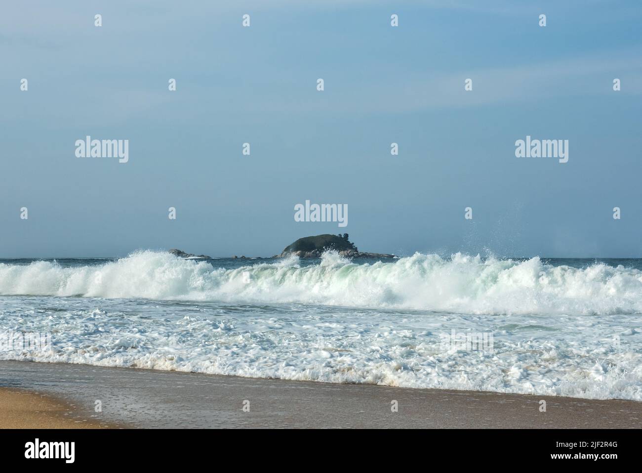 The big breaking waves during a strom at the beautiful summer sea shore ...