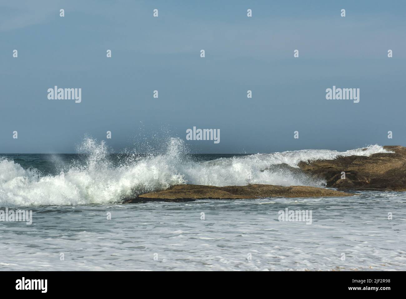 The big breaking waves during a strom at the beautiful summer sea shore ...