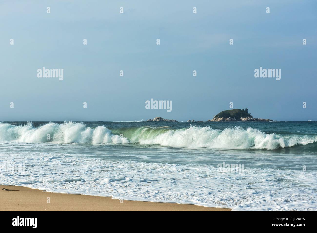 The big breaking waves during a strom at the beautiful summer sea shore ...