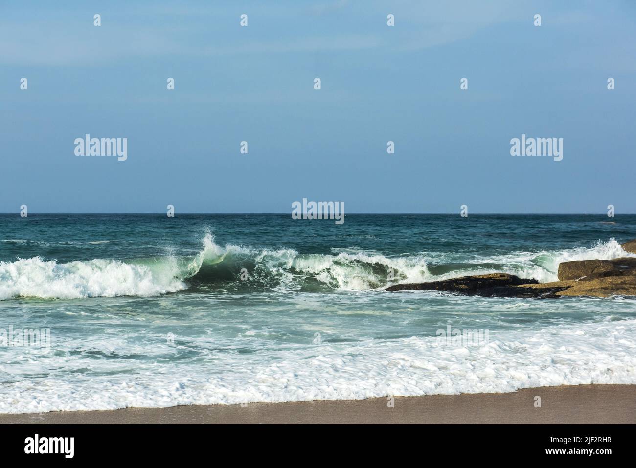 The big breaking waves during a strom at the beautiful summer sea shore ...