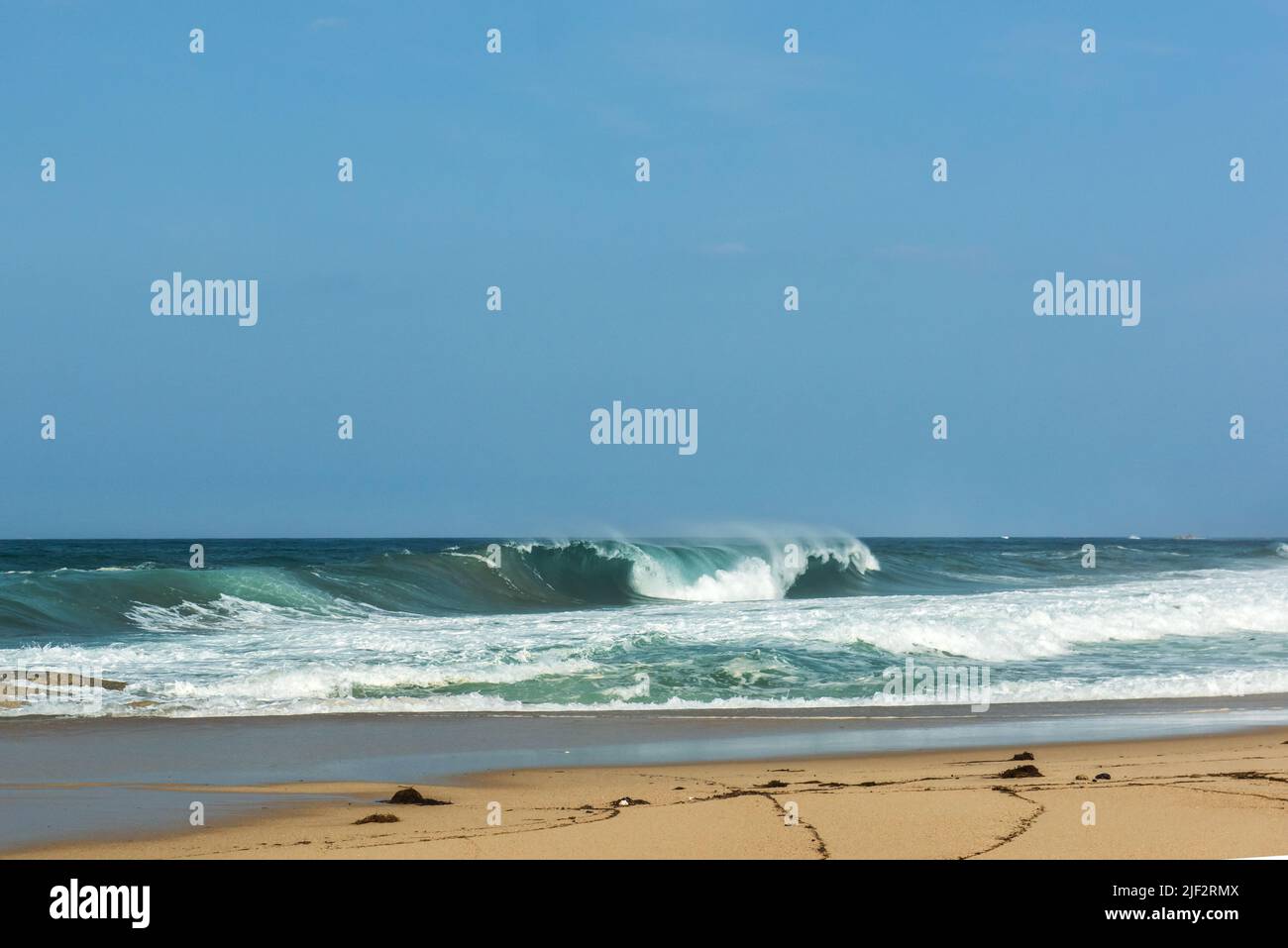 The big breaking waves during a strom at the beautiful summer sea shore ...