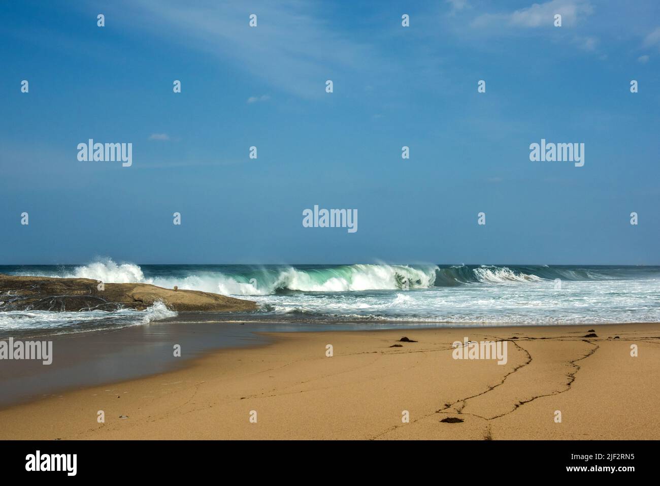 The big breaking waves during a strom at the beautiful summer sea shore ...