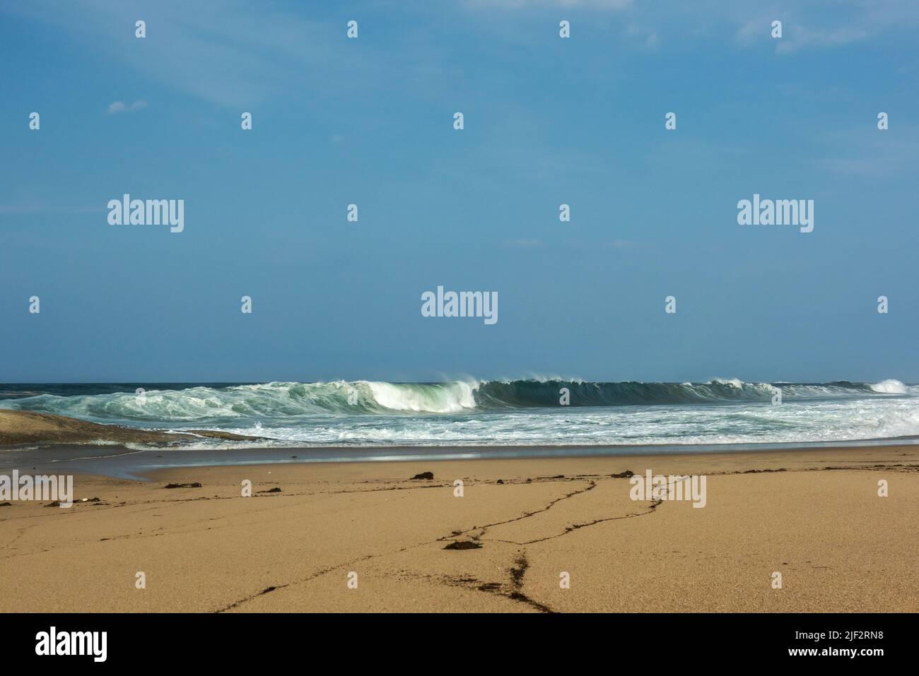The big breaking waves during a strom at the beautiful summer sea shore ...