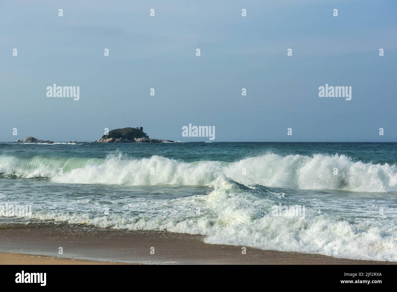 The big breaking waves during a strom at the beautiful summer sea shore ...